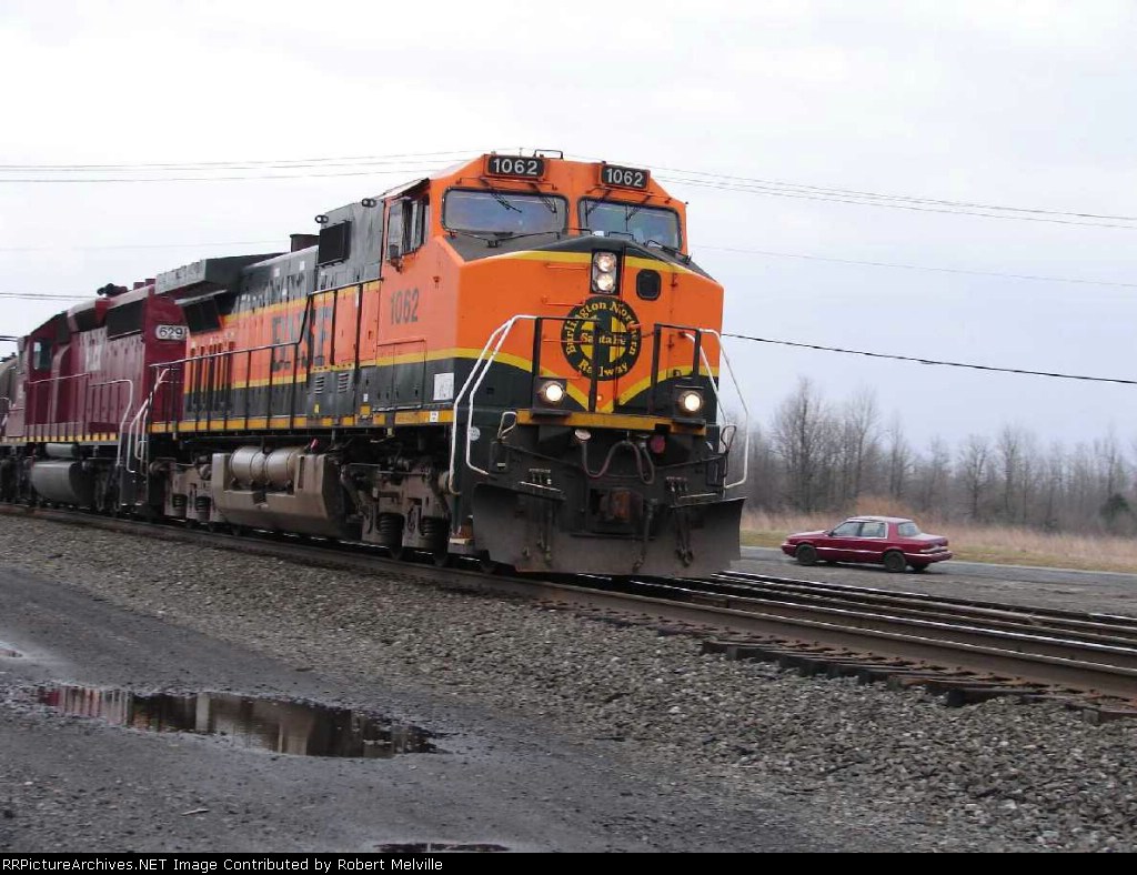 BNSF 1062; HLCX 6298 behind